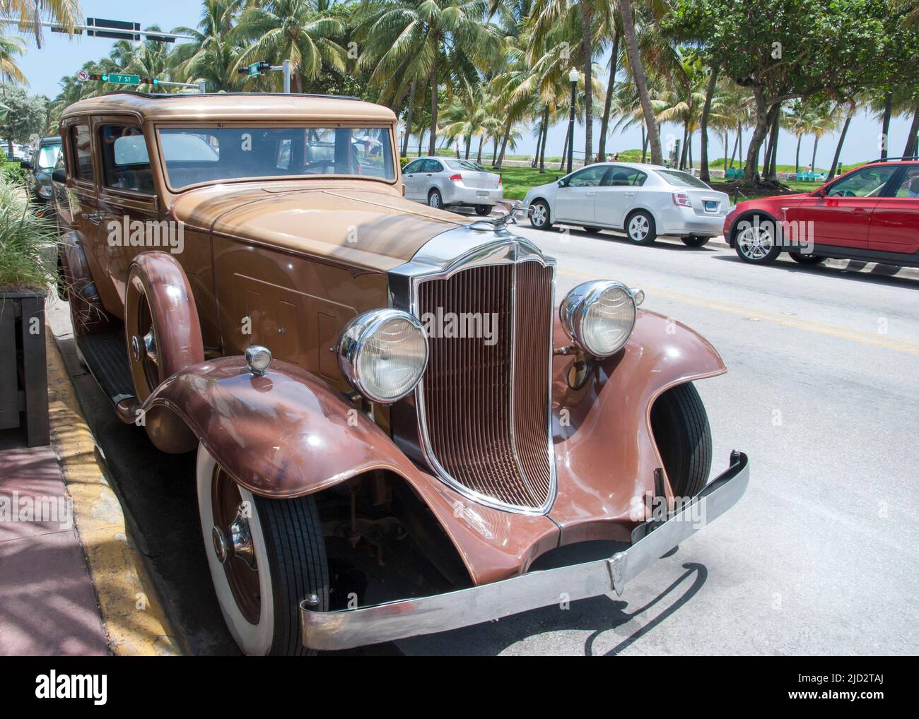 The luxury retro car parked in famous Ocean Drive in Miami Beach ...