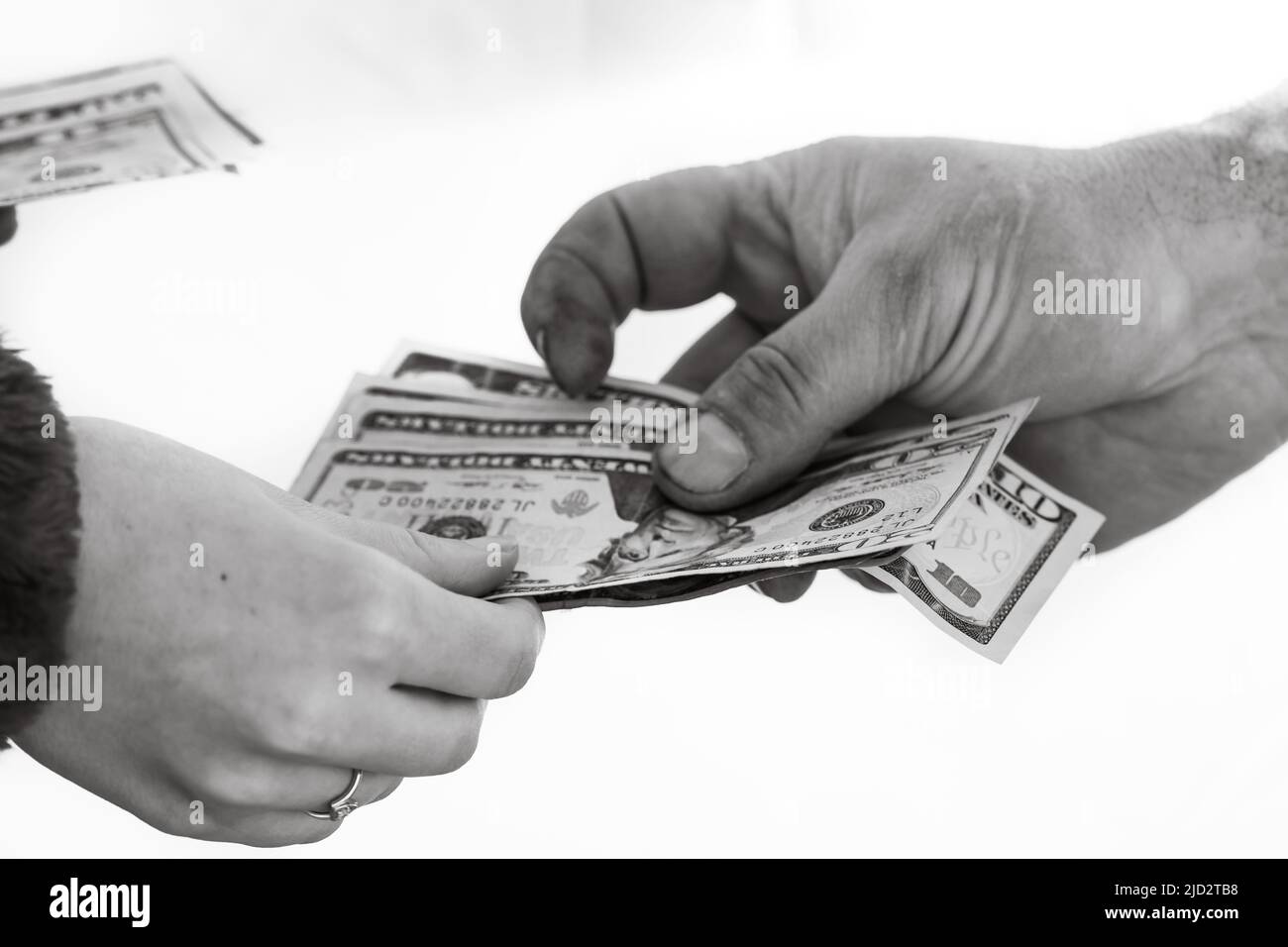 Hand giving money isolated, hard worked hand taking dollars money ...