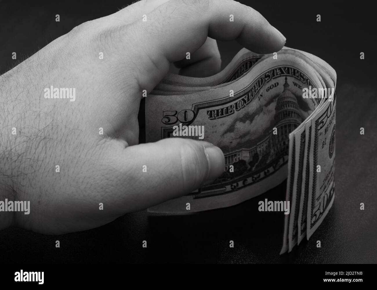 Man counting money, counting dollars close up Stock Photo - Alamy
