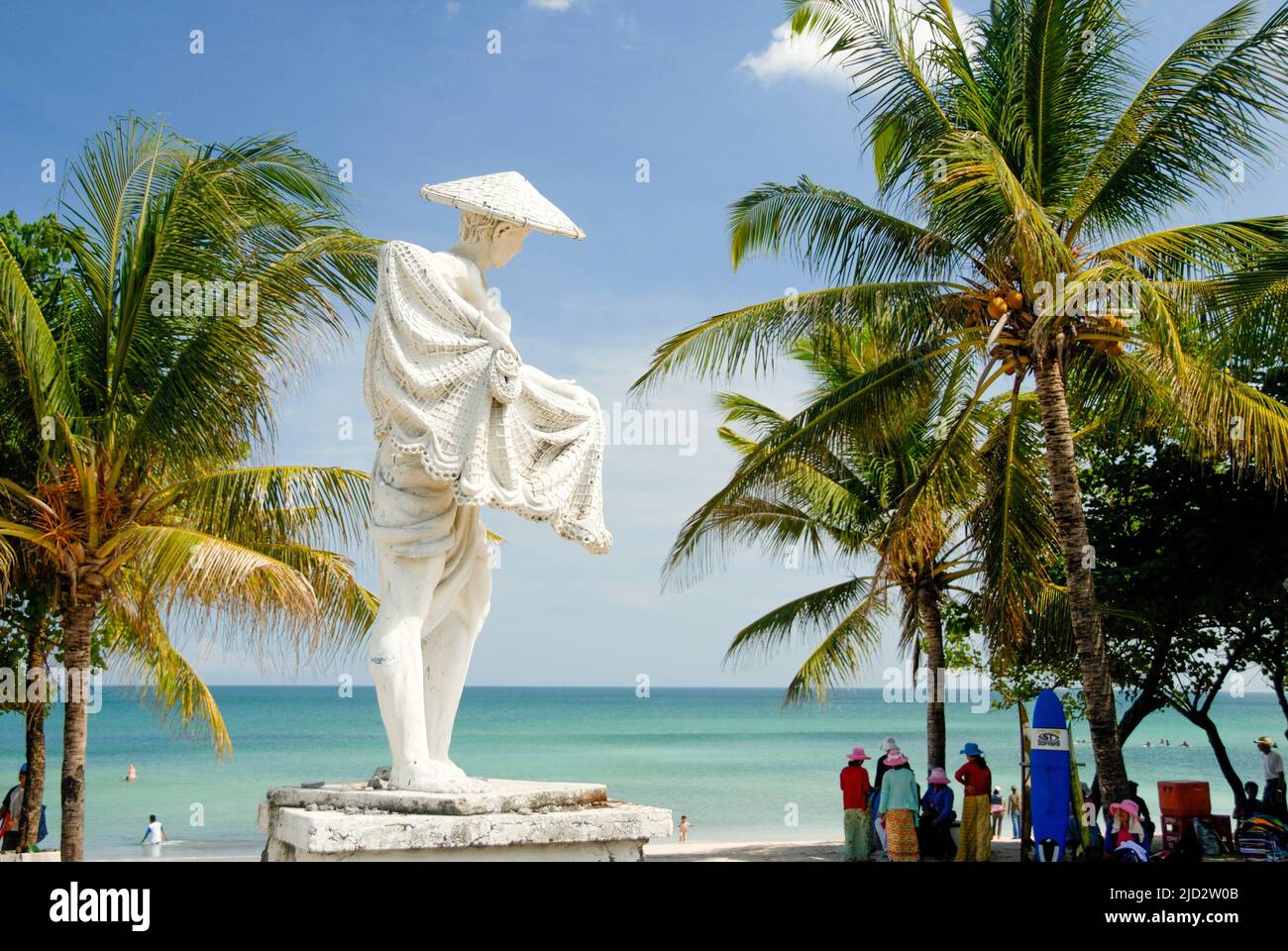 A statue of a traditional fisherman welcomes visitors onto Kuta's ...