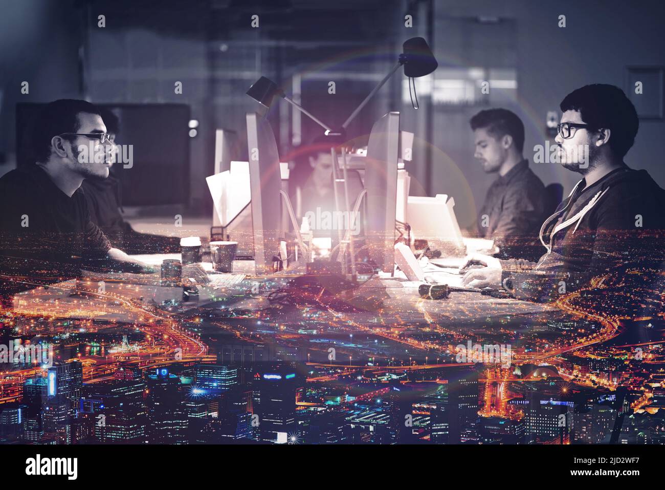 Getting the job done 247. Mutiple exposure shot of developers working ...
