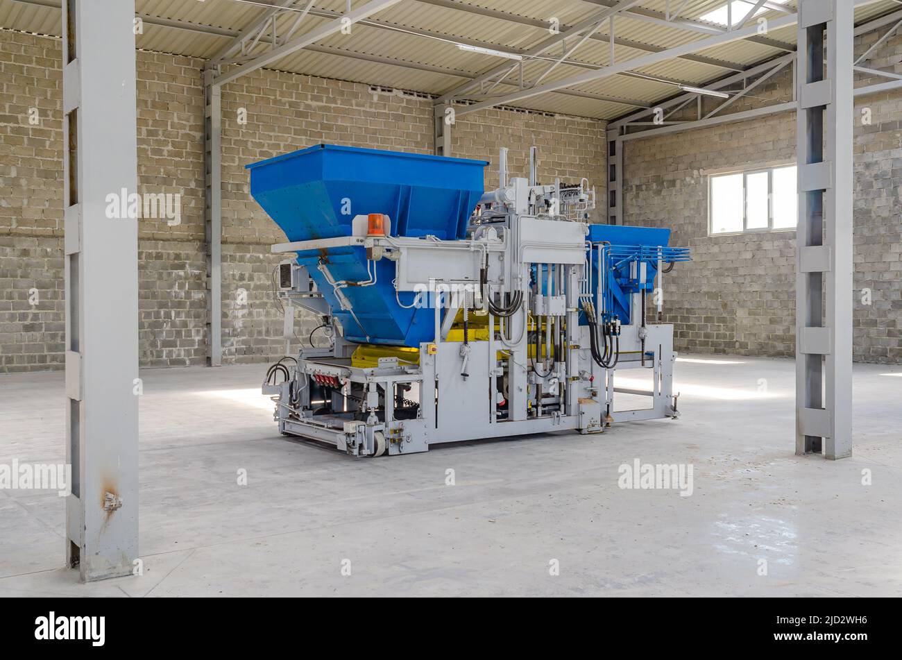 Front view molding machine for production of paving slabs. Pavement ...