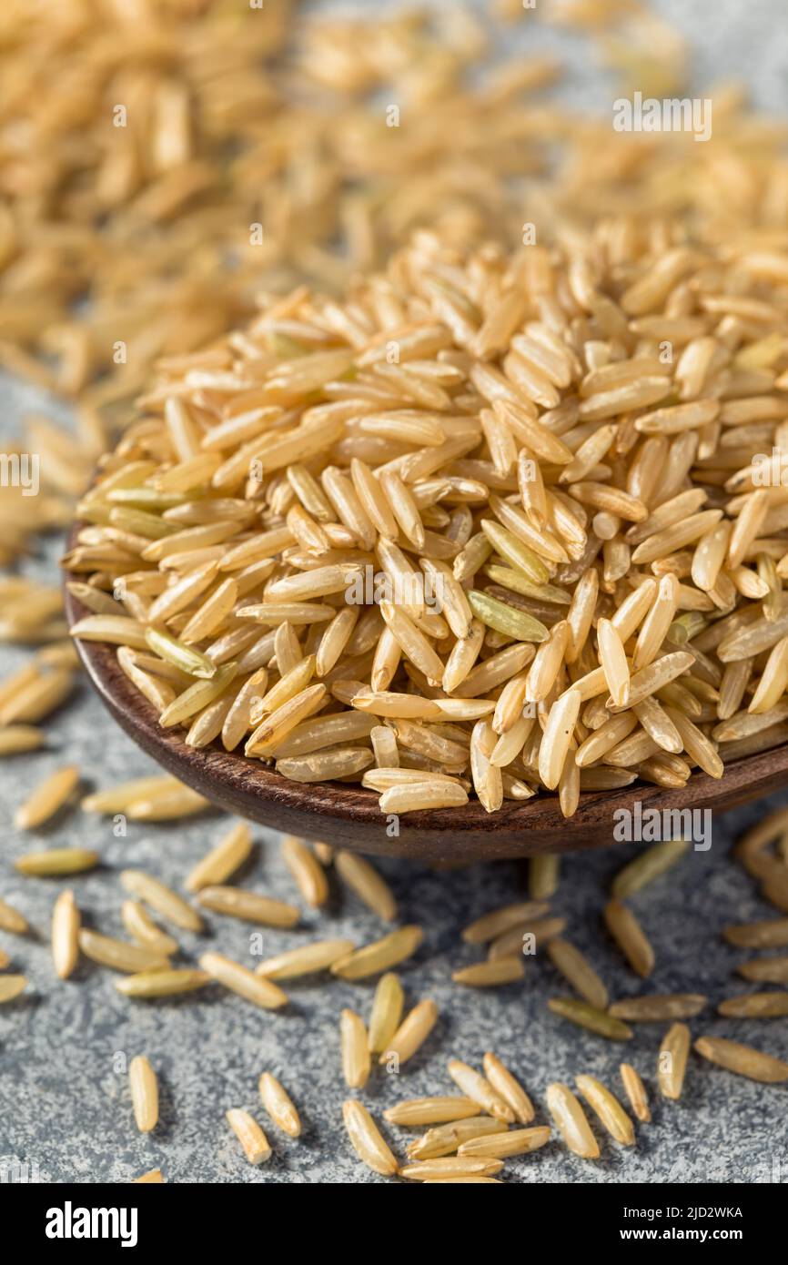 Raw Organic Dry Brown Rice Ready to Cook Stock Photo - Alamy