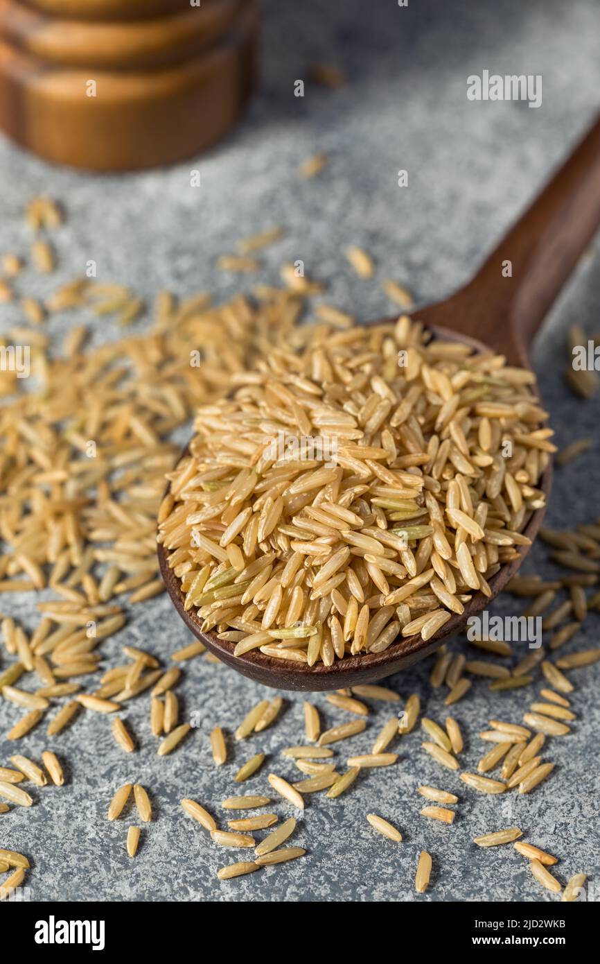 Raw Organic Dry Brown Rice Ready to Cook Stock Photo - Alamy