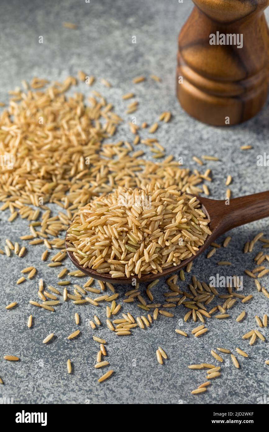 Raw Organic Dry Brown Rice Ready to Cook Stock Photo - Alamy