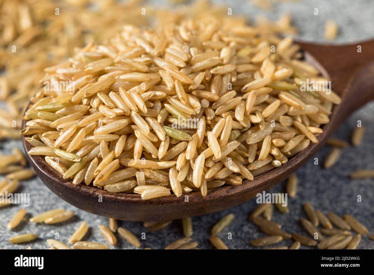 Raw Organic Dry Brown Rice Ready to Cook Stock Photo - Alamy