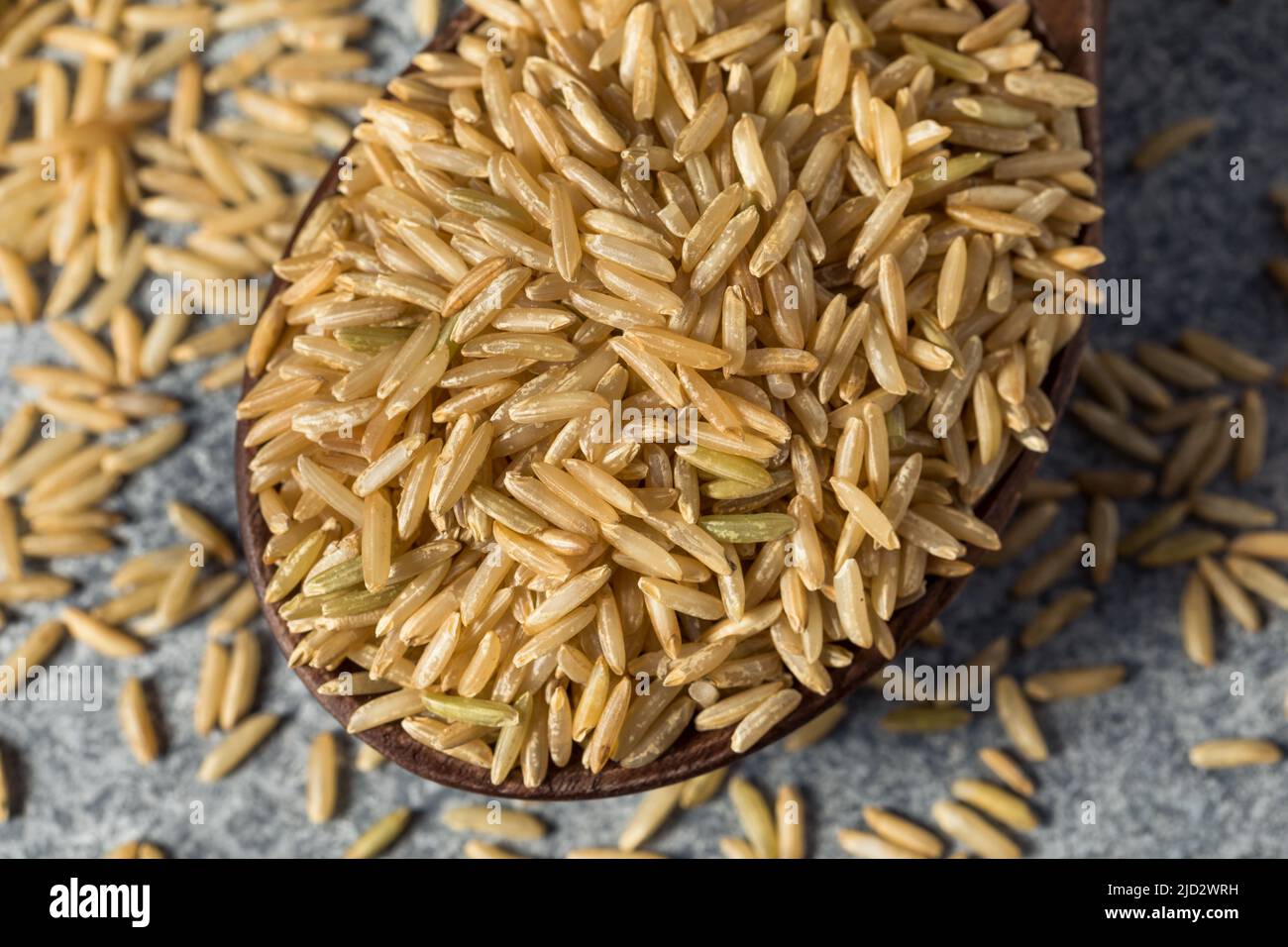 Raw Organic Dry Brown Rice Ready to Cook Stock Photo - Alamy