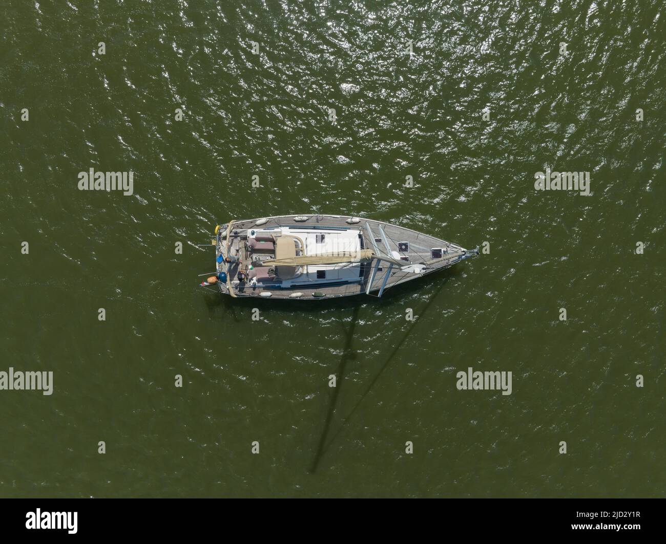 Sail yacht recreation ship vessel overhead top down aerial drone view ...