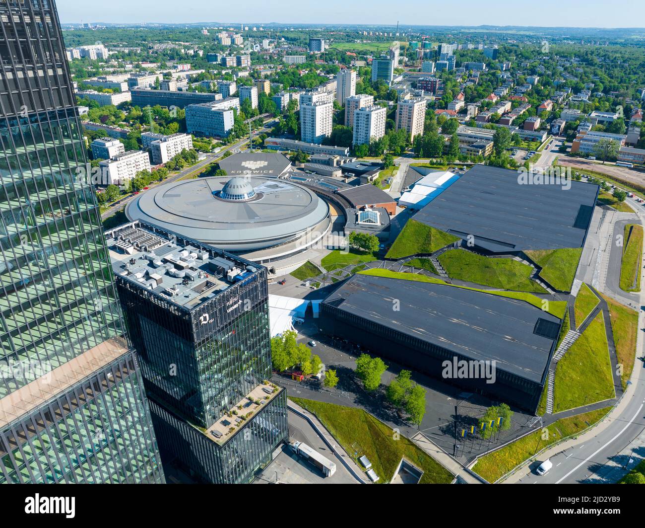 Aerial photo of “Spodek” arena complex and modern city center of ...