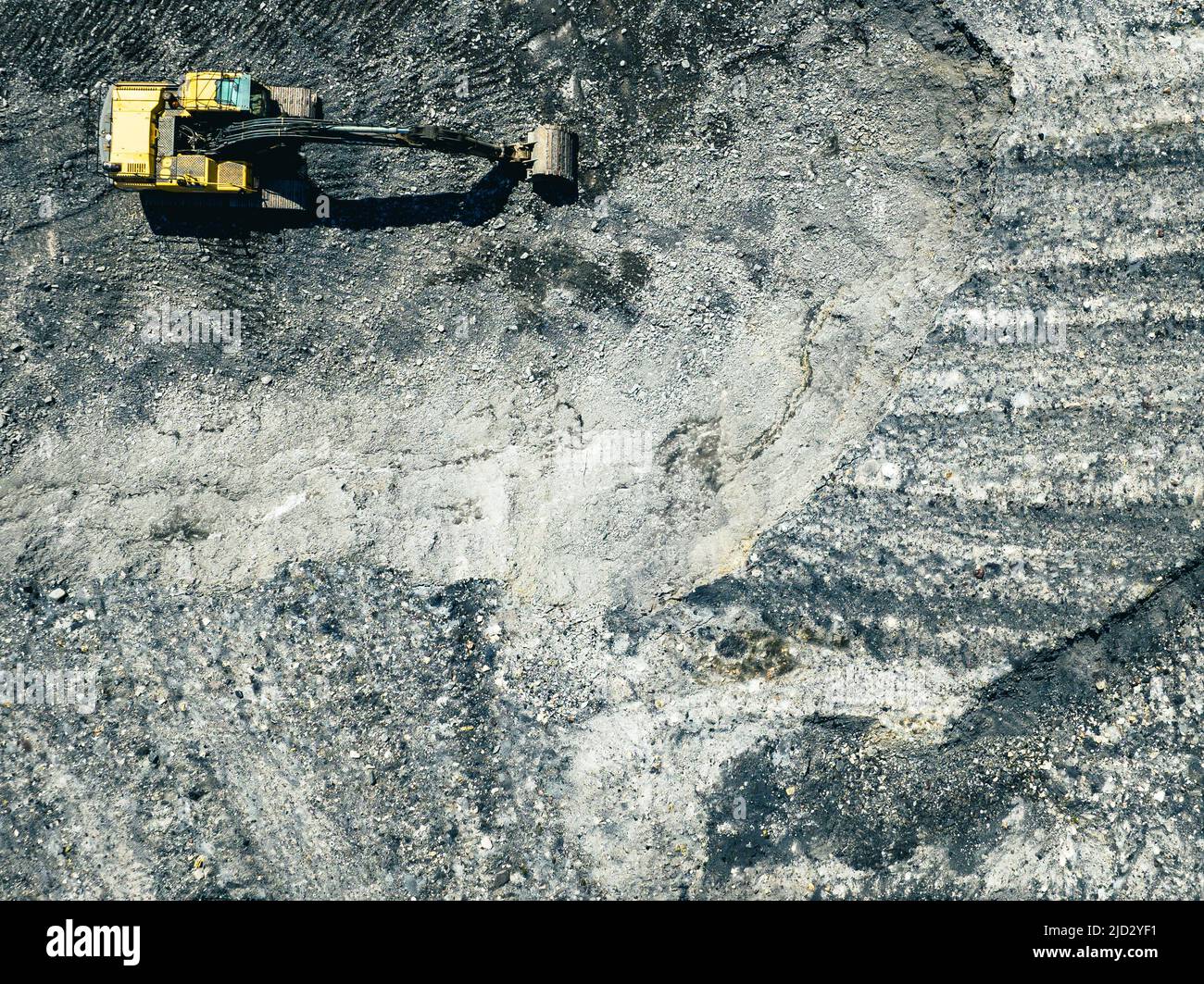 Aerial photo of excavator on industrial place. Construction site top ...