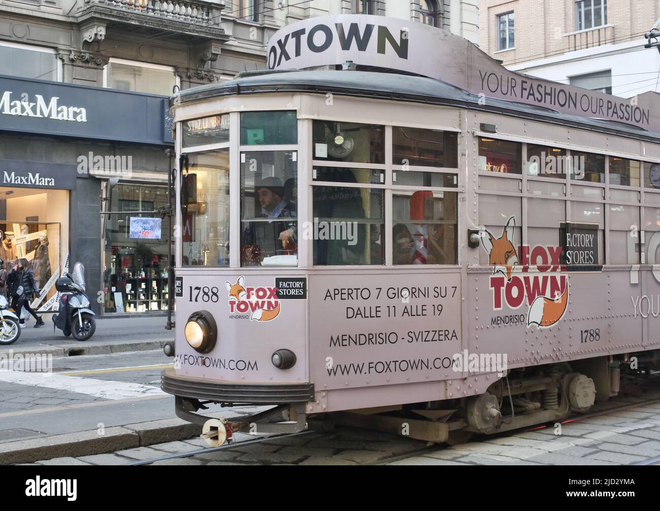 Vintage tram in Milan. Milan transportation system carries 2 million ...