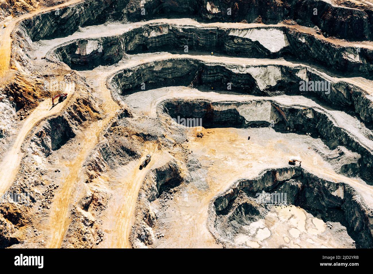 Aerial view of industrial terraces on mineral mine. Opencast mining ...