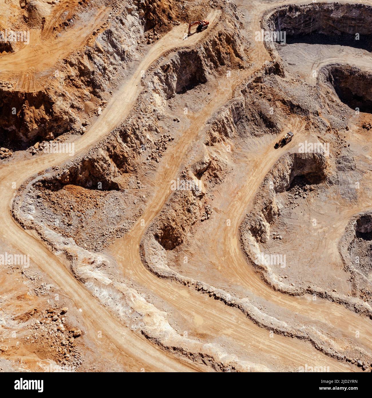 Aerial view of industrial terraces on mineral mine. Opencast mining ...