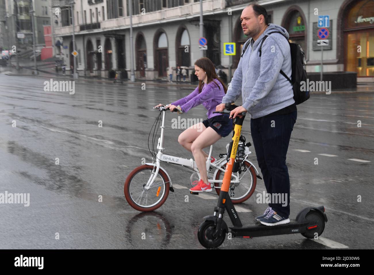 Moscow. Passersby on the street during a rain Stock Photo - Alamy