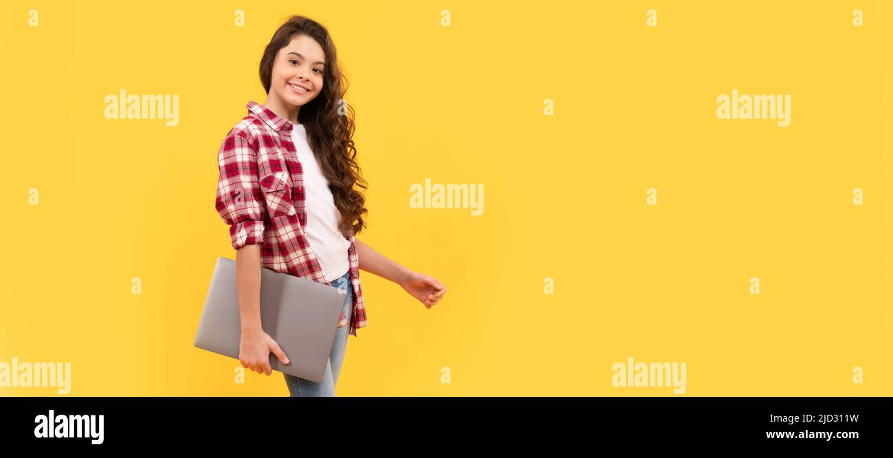 E-learning is a better way of learning. Happy girl child carry laptop ...