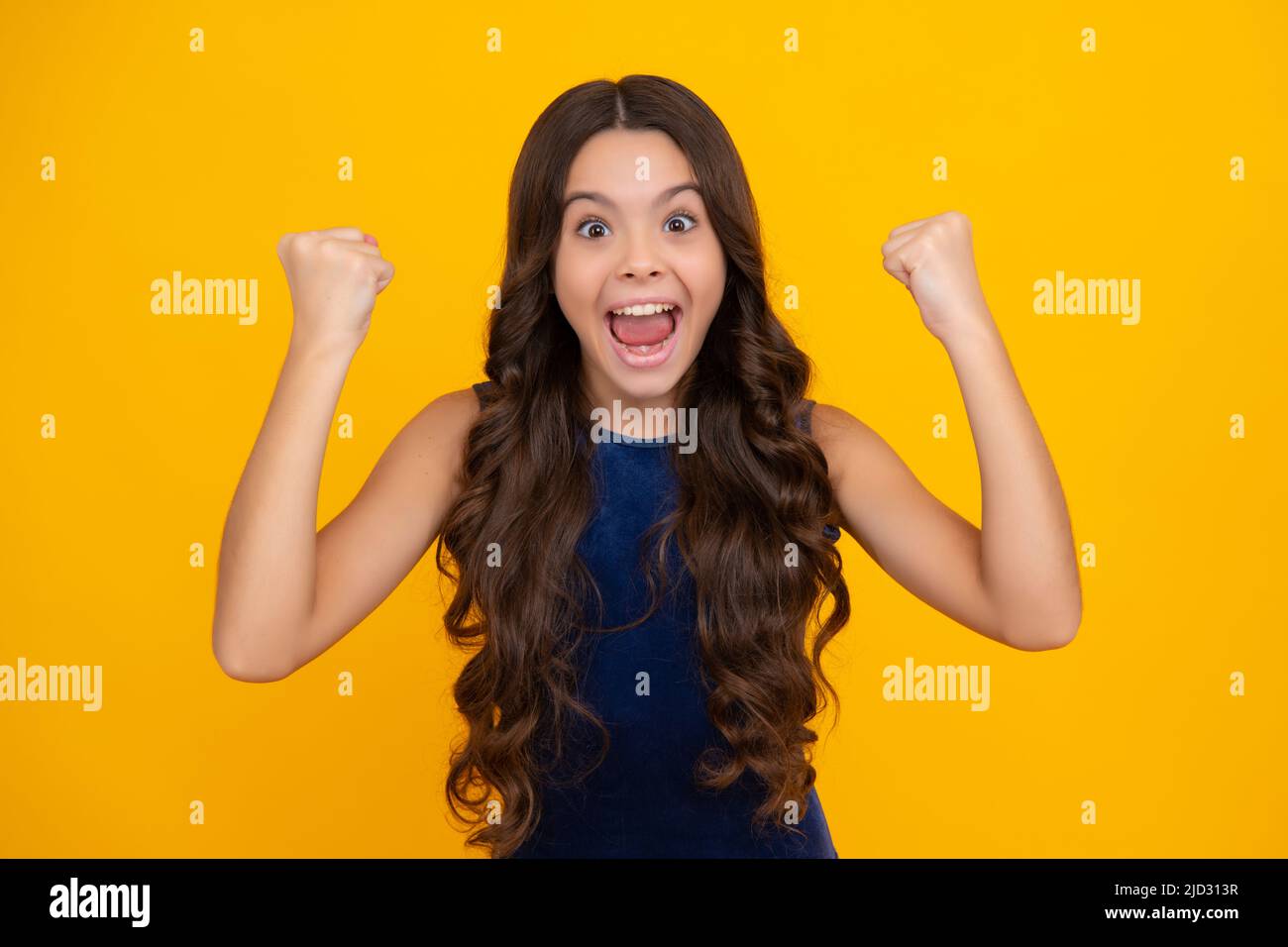 Amazed teen girl. Excited expression, cheerful and glad. Joy, victory ...