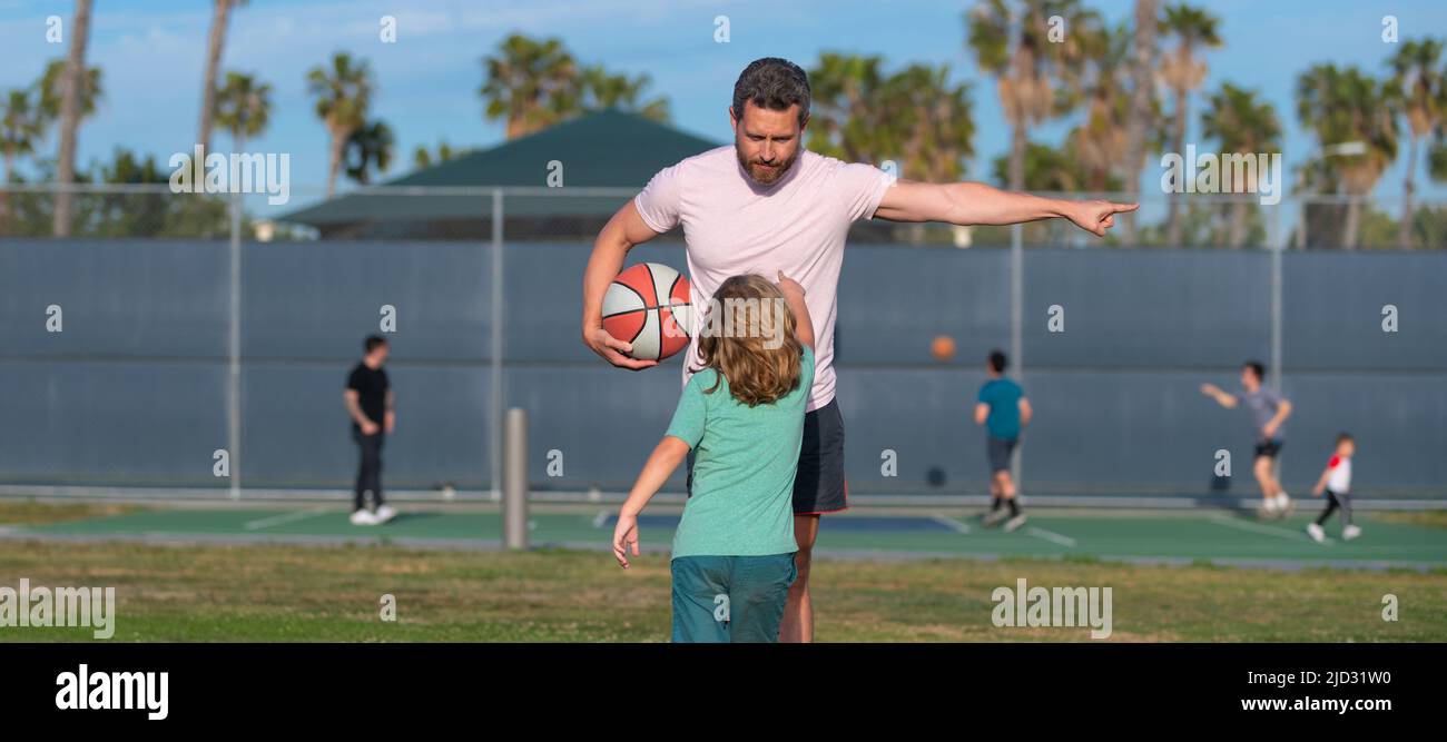 Boy child listen to man trainer explaining basketball rules on sports ...