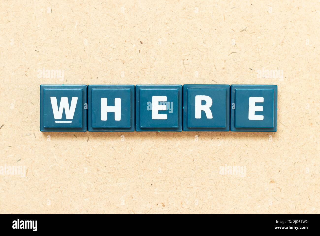 Tile alphabet letter in word where on wood background Stock Photo - Alamy