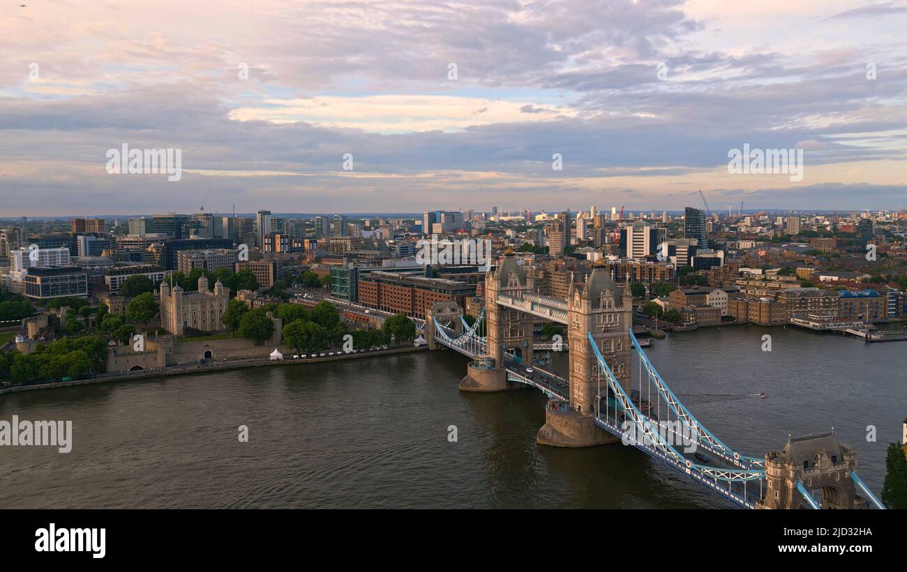 Aerial view over Tower Bridge and River Thames in London at sunset ...