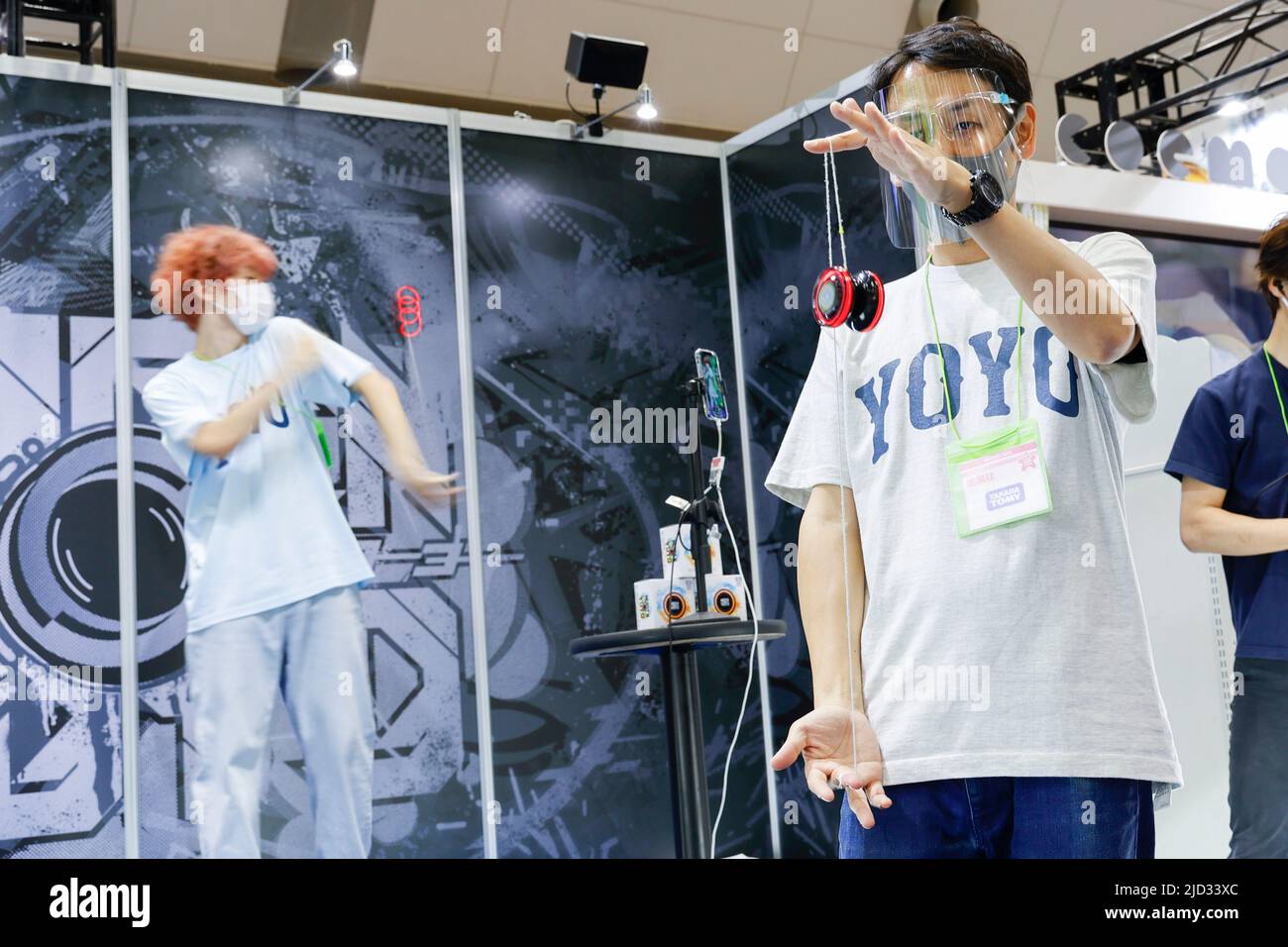 Tokyo, Japan. 17th June, 2022. Exhibitors play with yoyos during the ...
