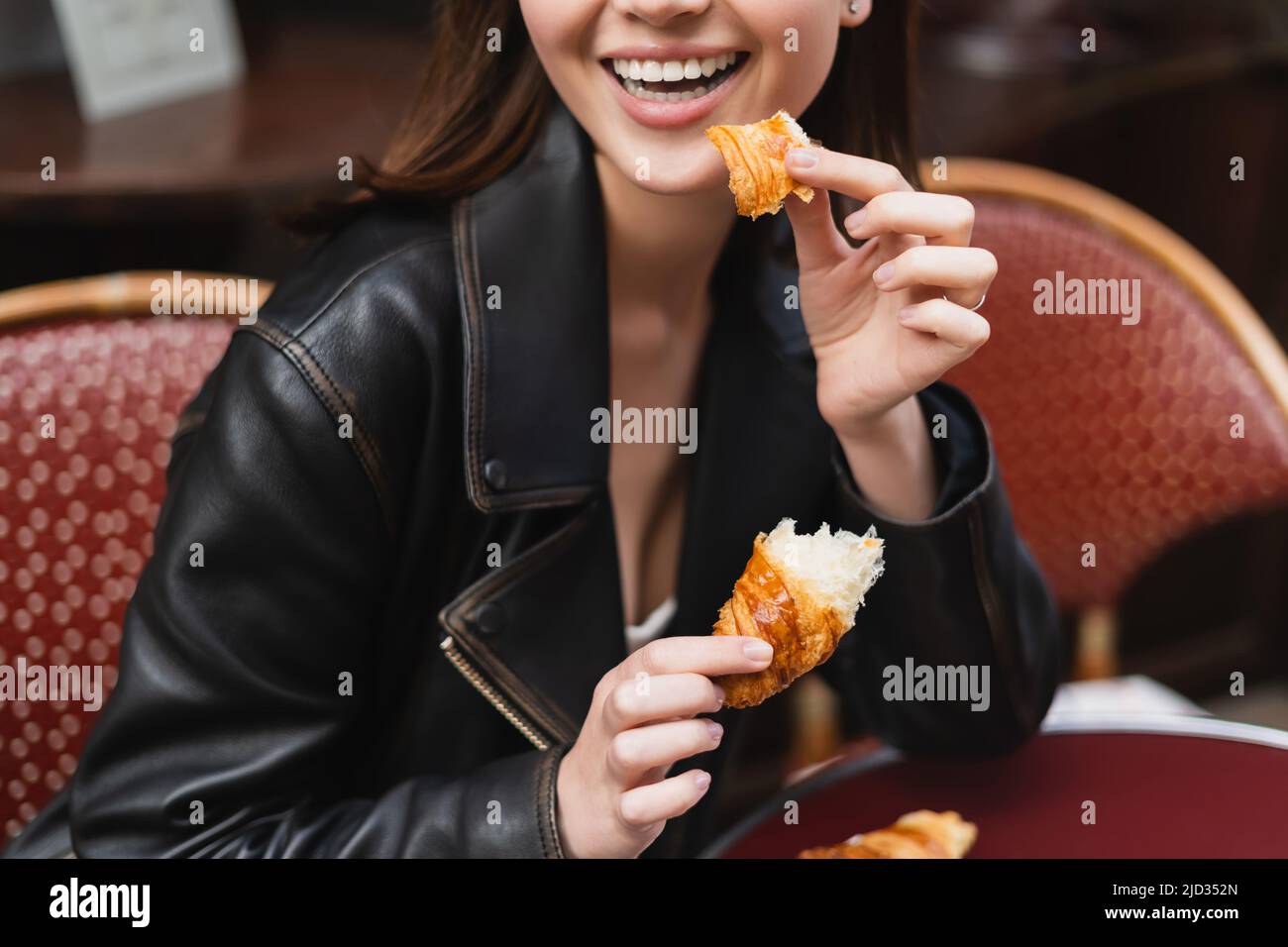 Paris cafe woman outside croissant hi-res stock photography and images ...