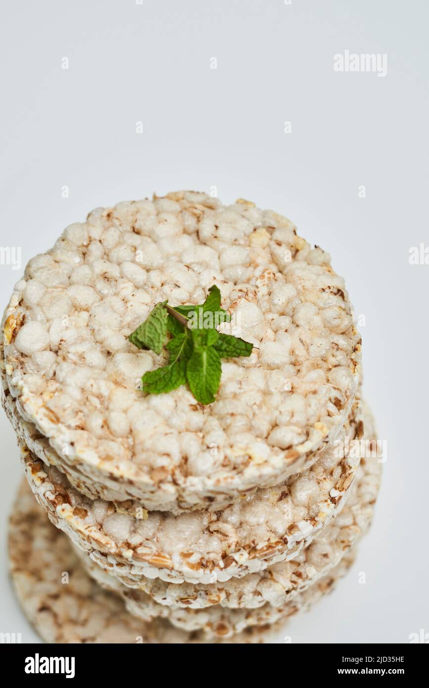 Stack of rice cakes on white background. Top view Stock Photo - Alamy
