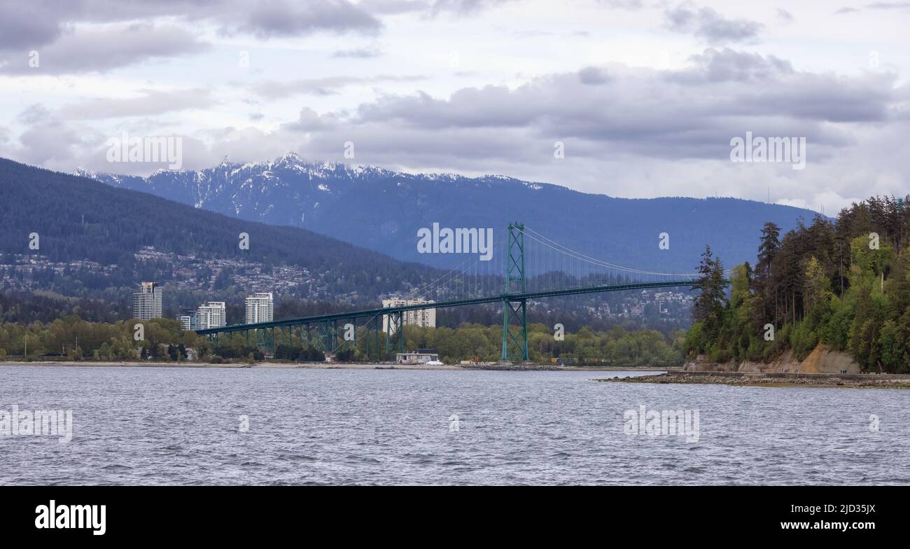 Lions Gate Bridge in a modern city on the West Coast of Pacific Ocean ...