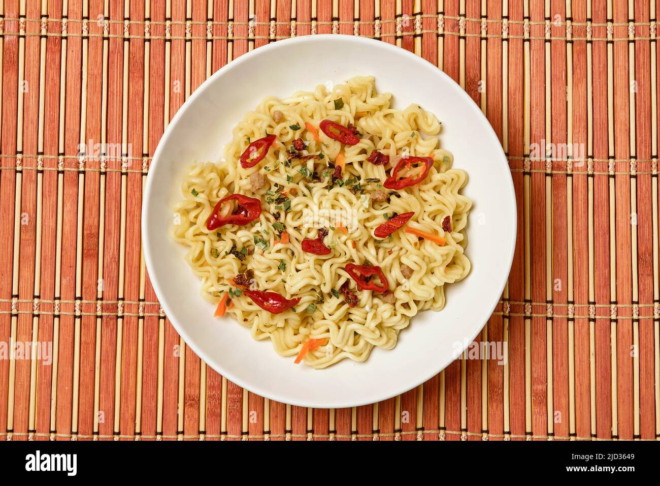 Instant noodles composition. Noodles and fresh vegetables and spices ...