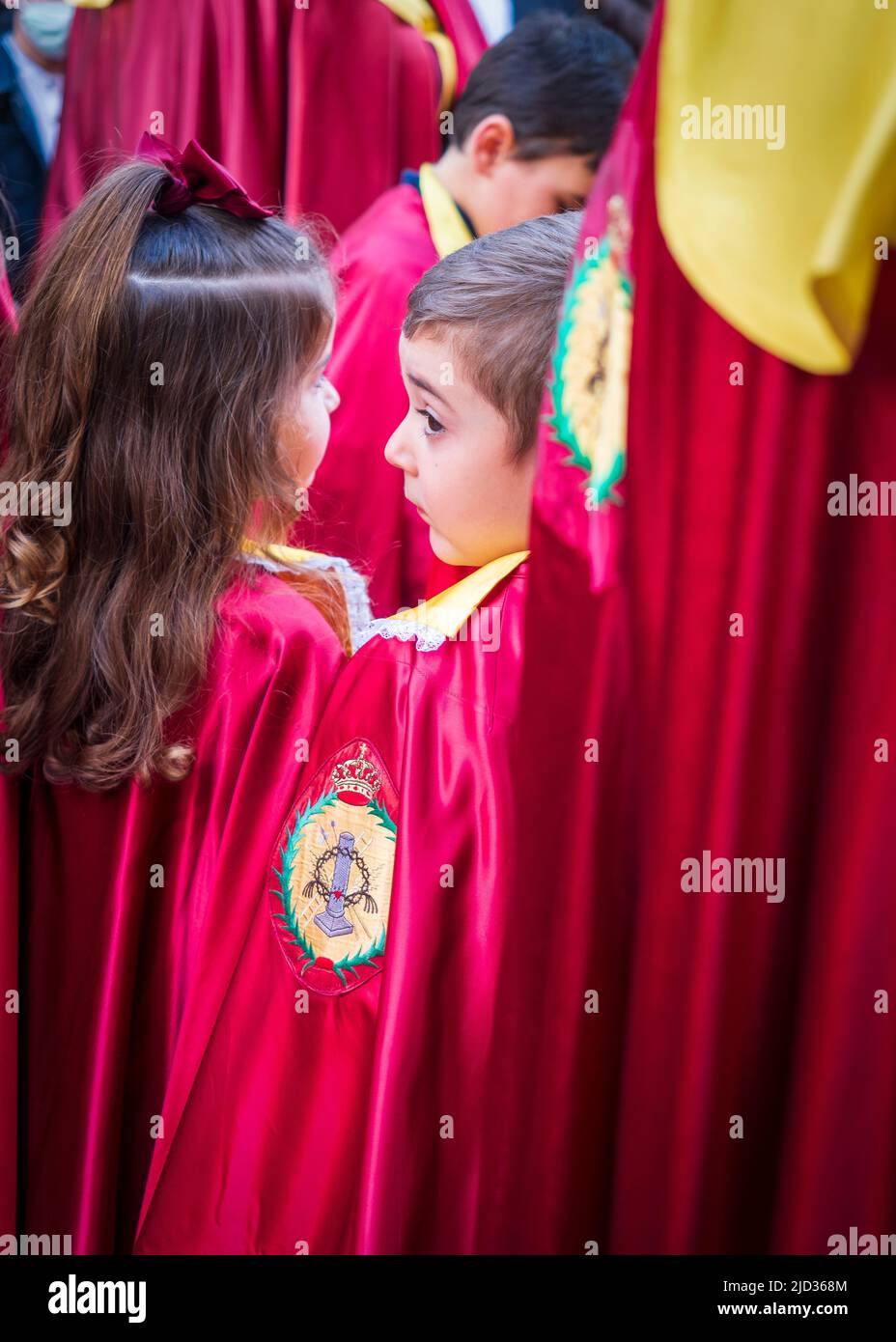 Nazarenes and brotherhoods parading through the streets of Ubeda during ...