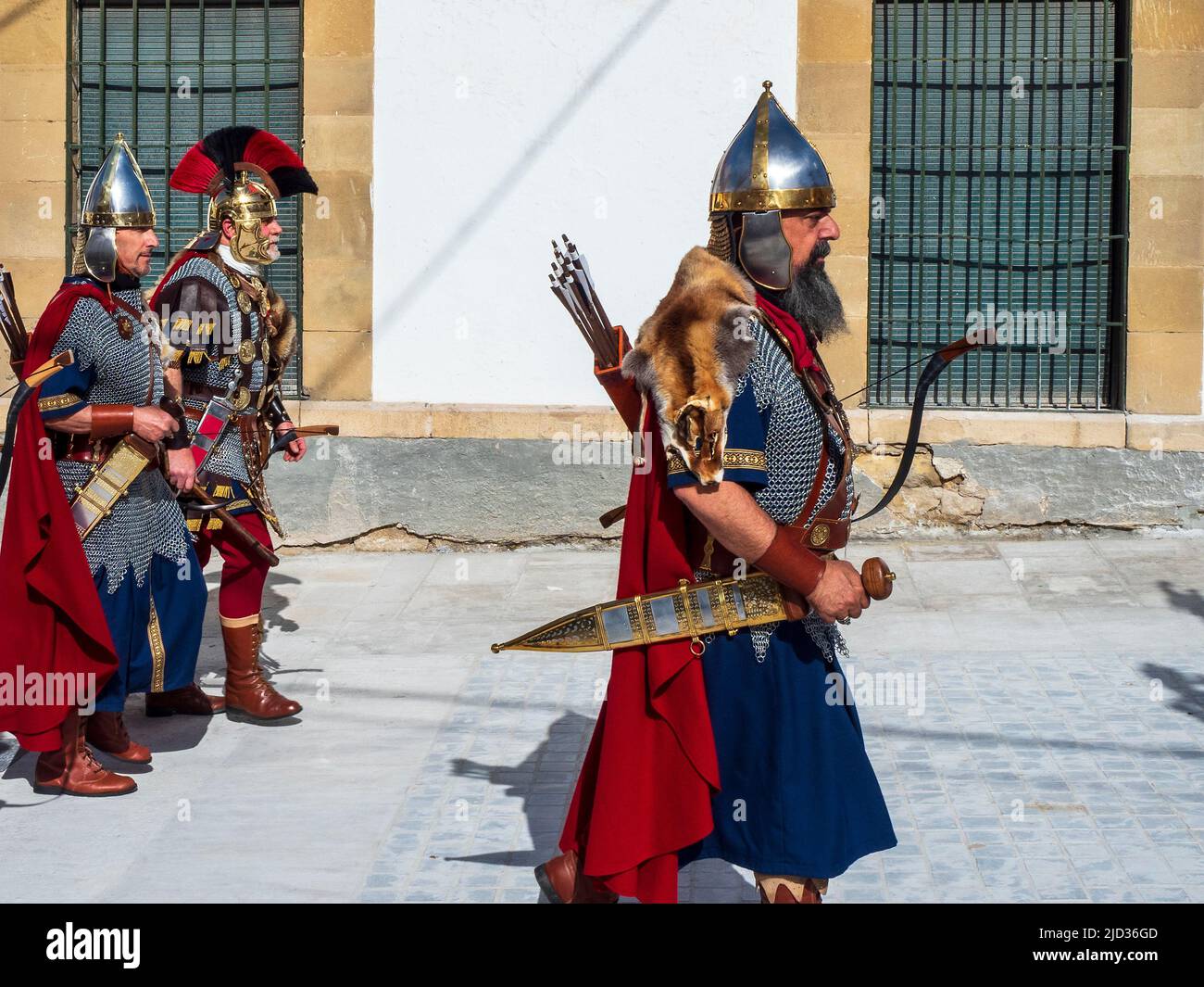 Nazarenes and brotherhoods parading through the streets of Ubeda during ...