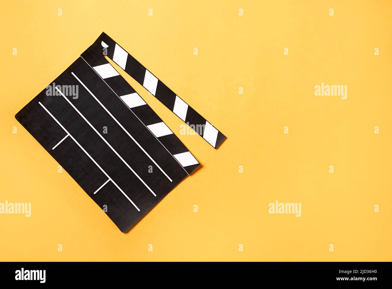 Photo of movie clapper on red background Stock Photo - Alamy