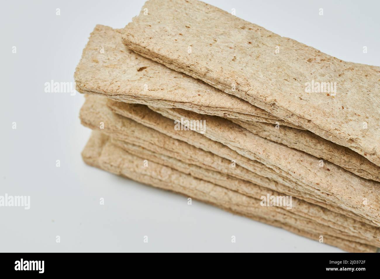 Rye crispbread on white background. Healthy food Stock Photo - Alamy