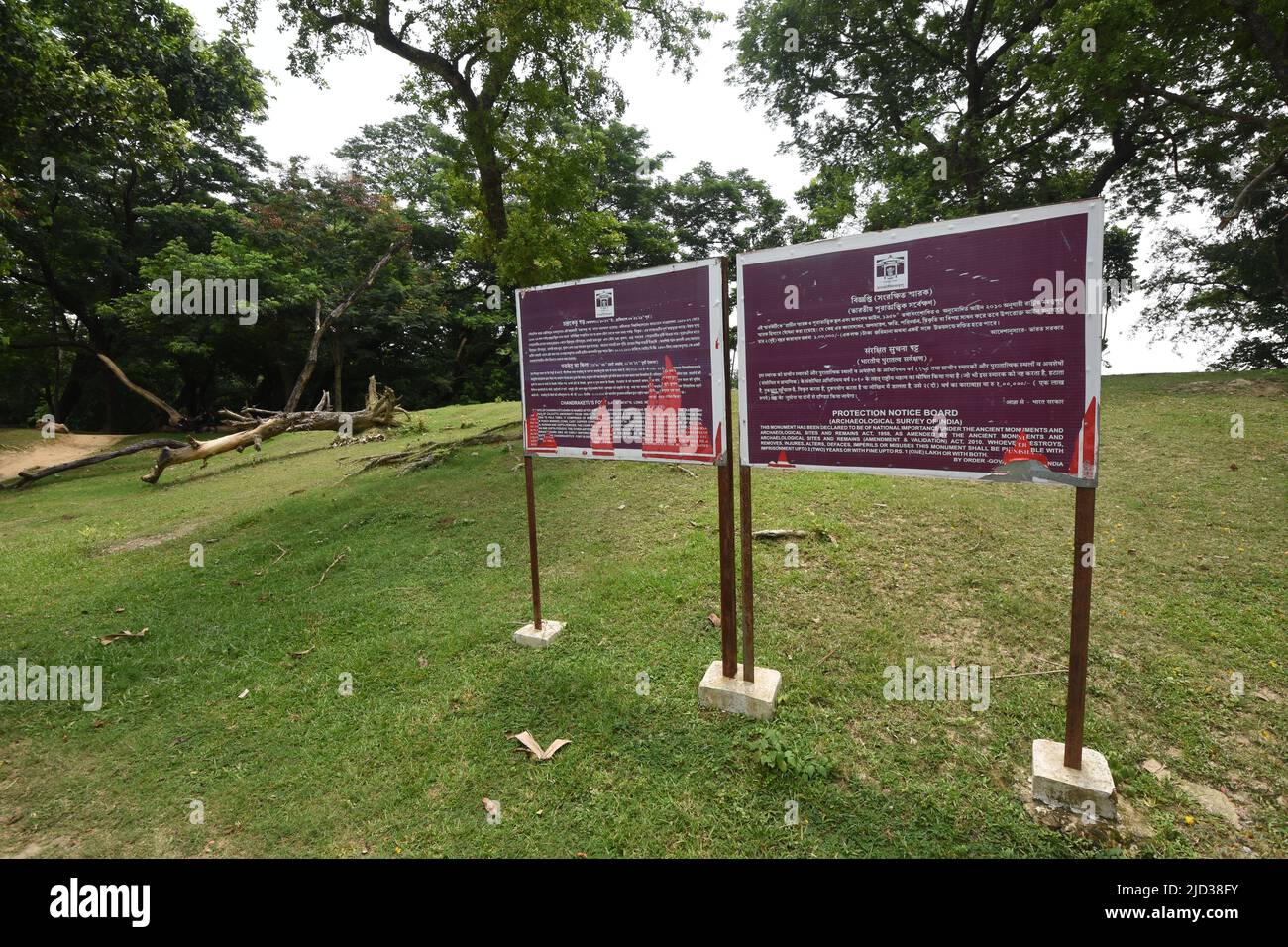 The Archaeological Survey of India (ASI) signage at the ancient mound ...