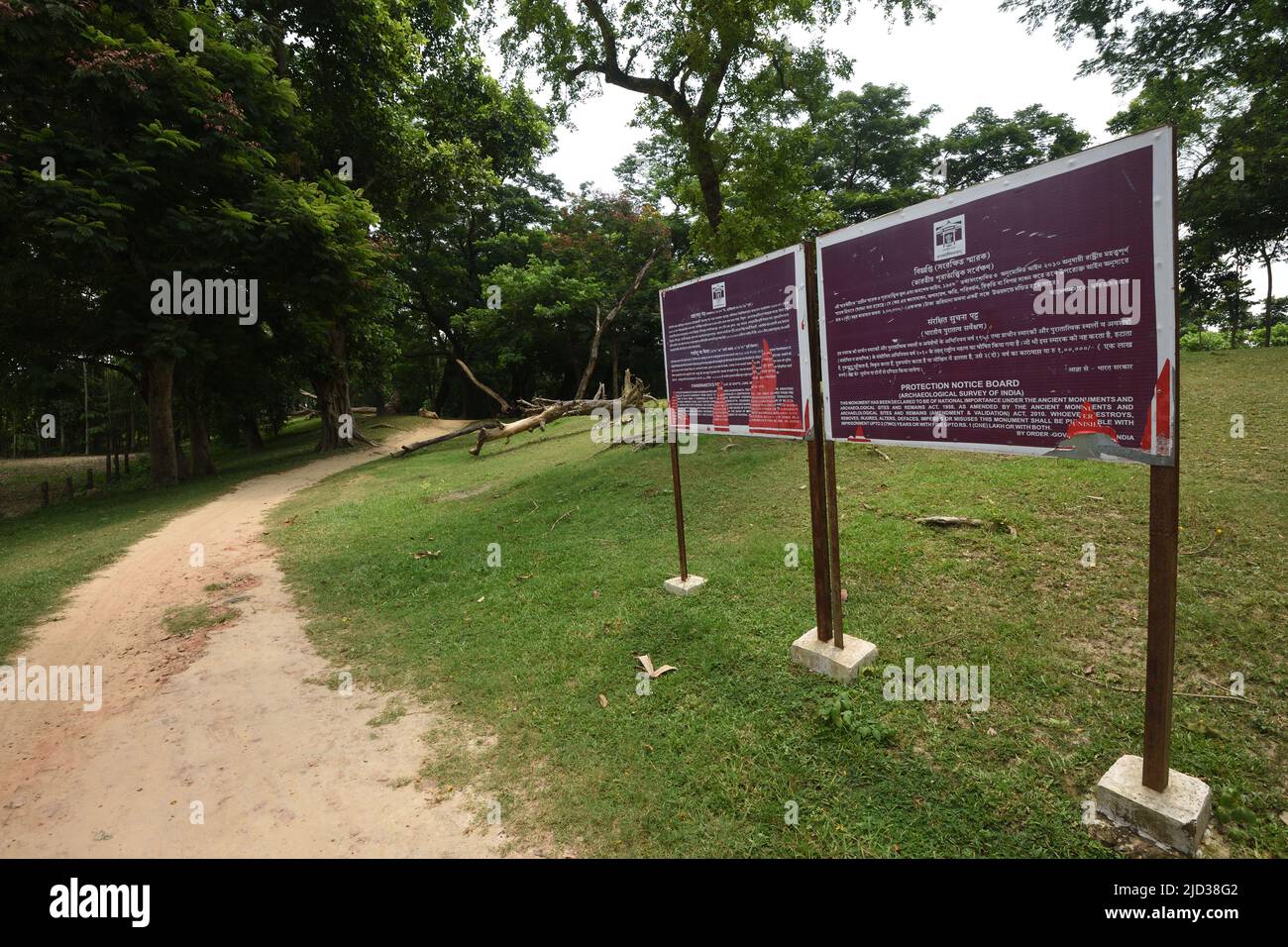 The Archaeological Survey of India (ASI) signage at the ancient mound ...