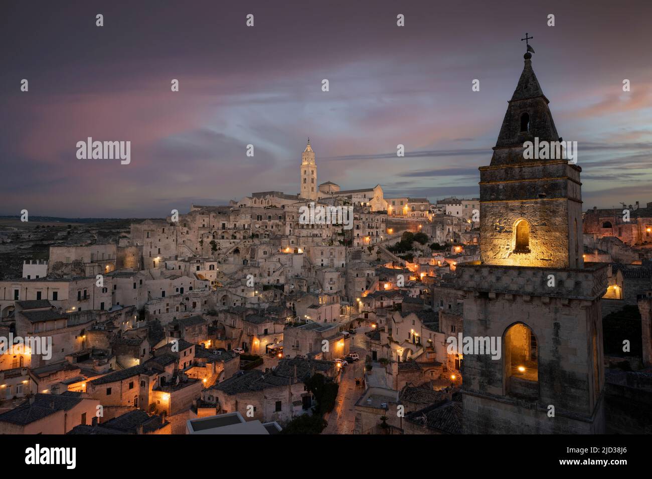 Stunning view of the illuminated village of Matera during a beautiful ...