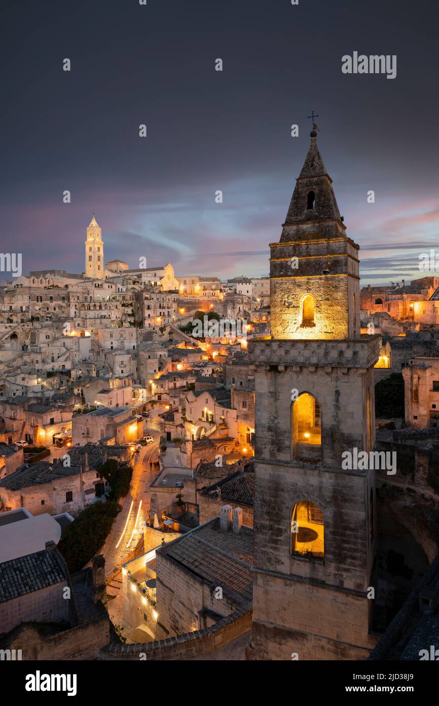 Stunning view of the illuminated village of Matera during a beautiful ...