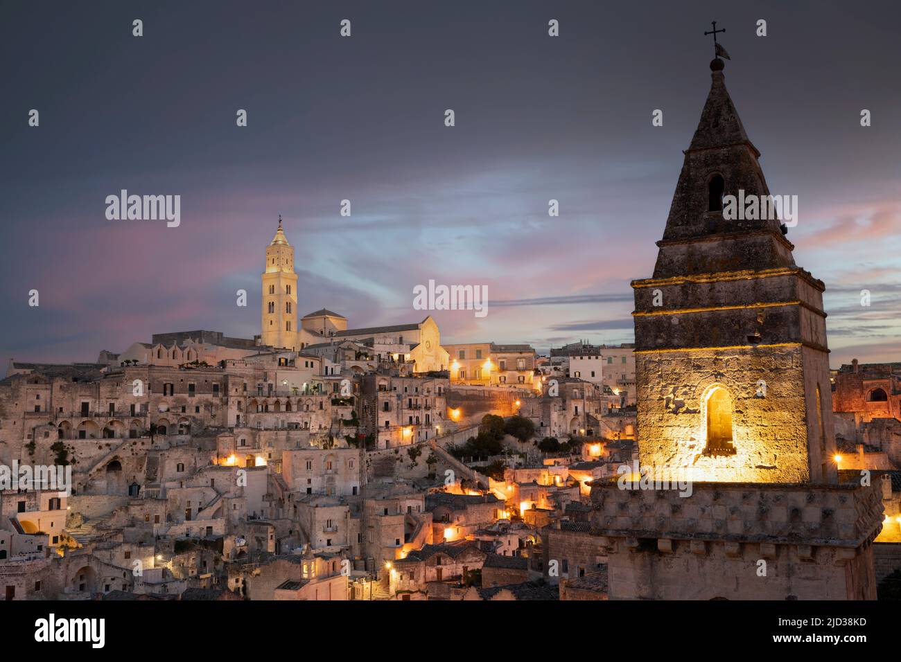 Stunning view of the illuminated village of Matera during a beautiful ...