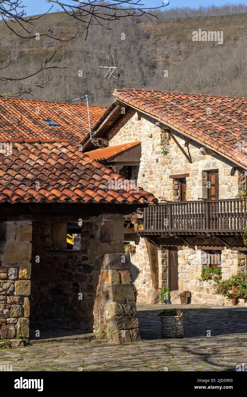 Beautiful village of Barcena Mayor with the traditional stone houses in ...