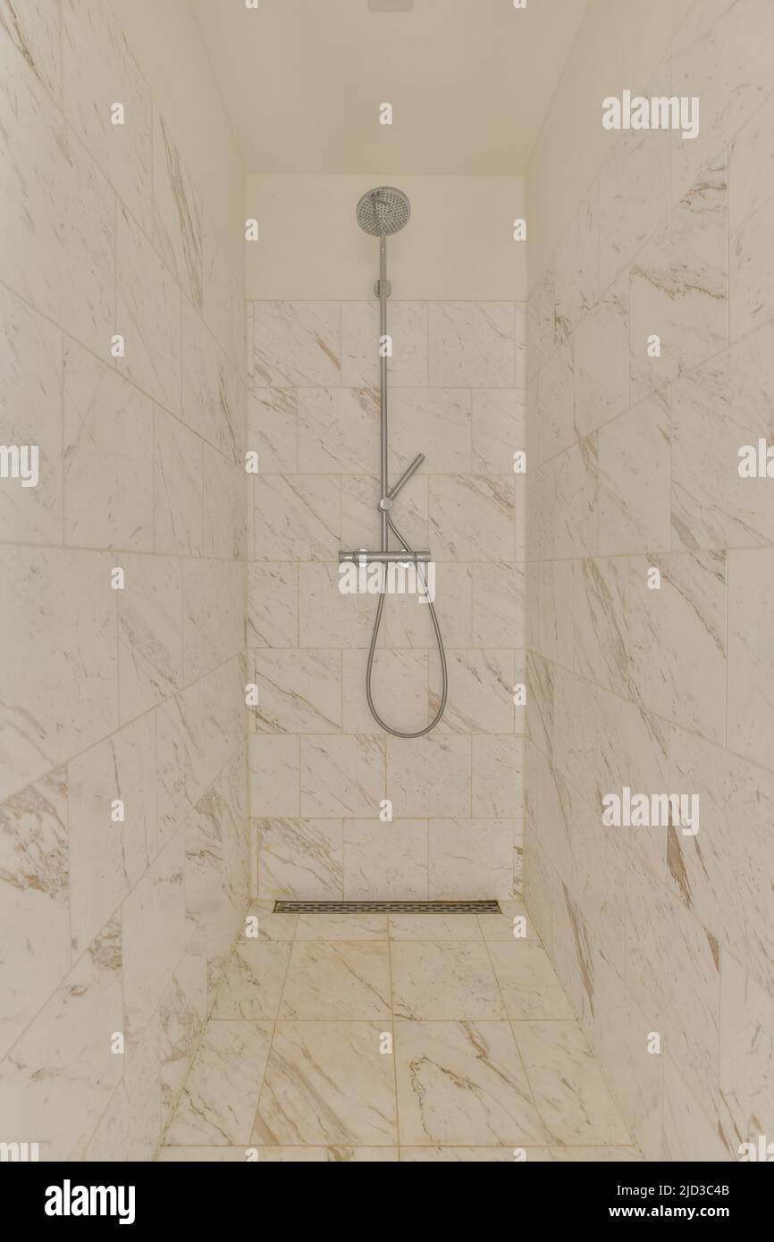 Modern bathroom with shower and sink Stock Photo - Alamy