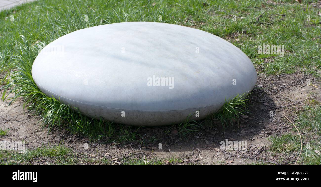round stone in park at dry sunny summer day Stock Photo - Alamy