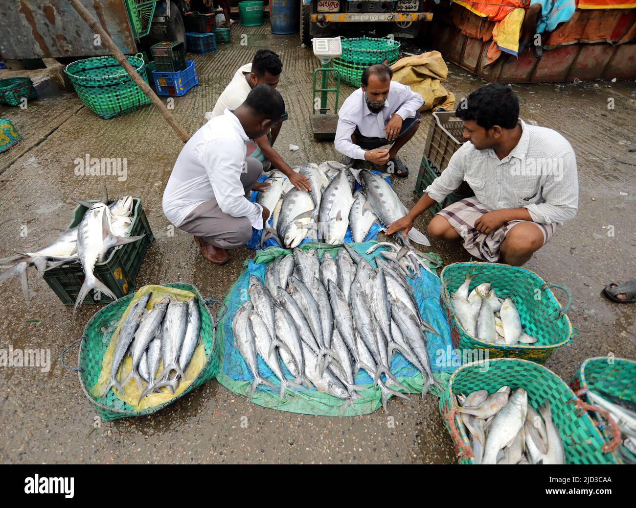CHITTAGONG, BANGLADESH - JUNE 13: Buyers and sellers are seen at the ...