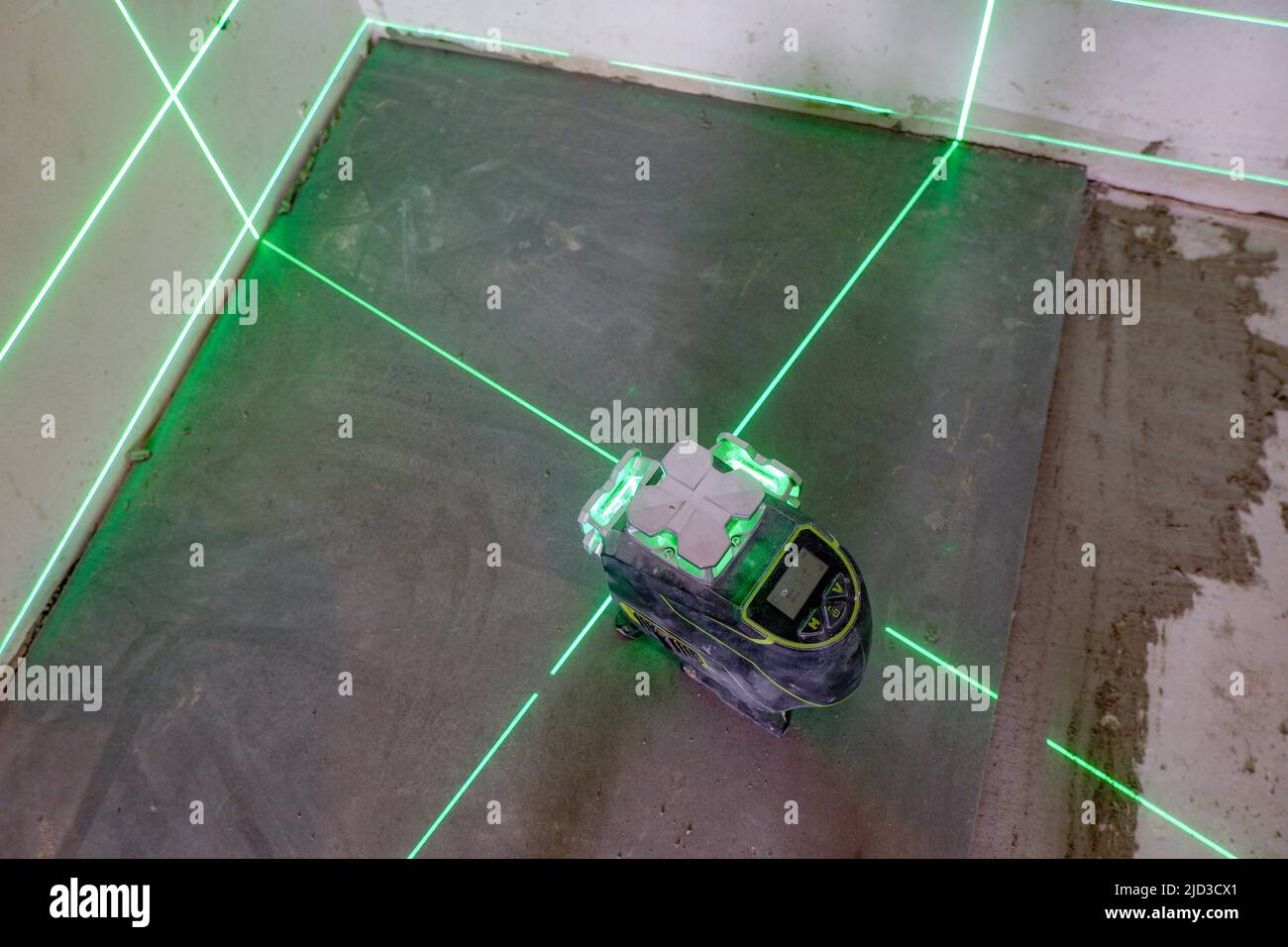 the laser level marks the lines for marking on the construction site ...