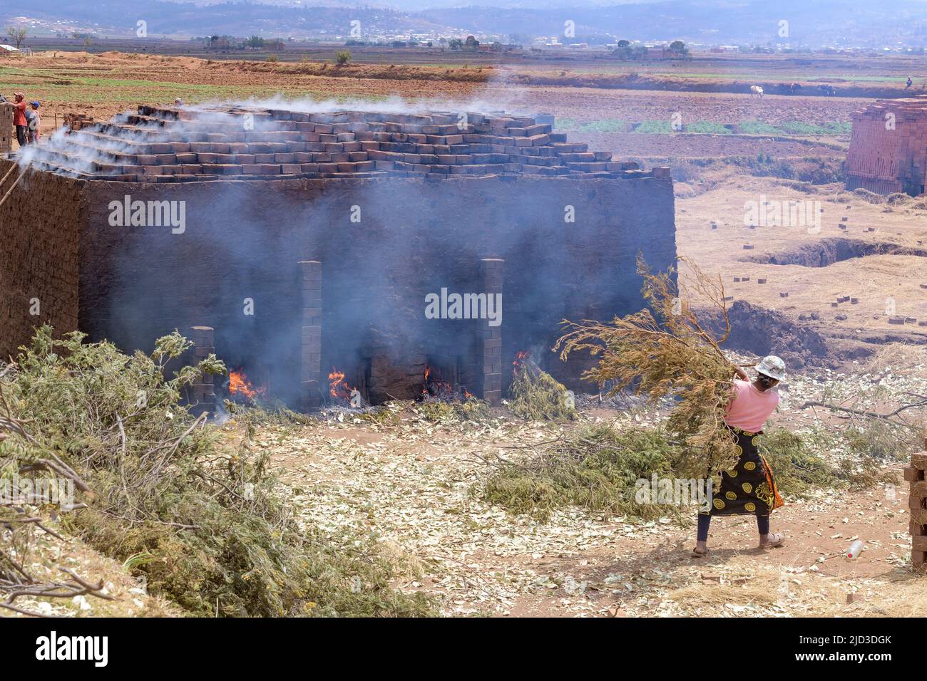 Lime kiln in eastern Madagascar. The bricks are used for building ...