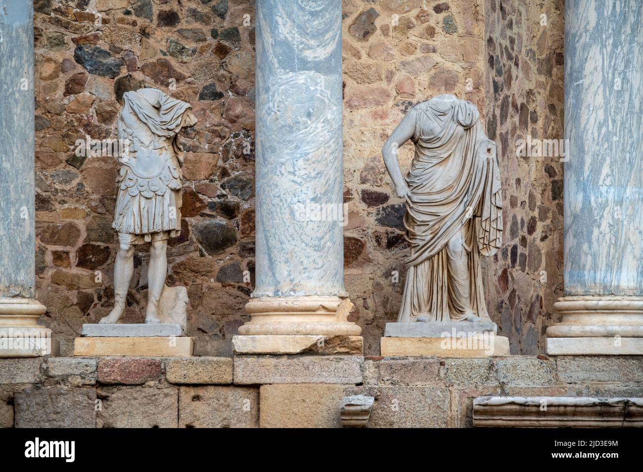 Statues amongst the columns of the Roman Theatre of Merida, Merida ...