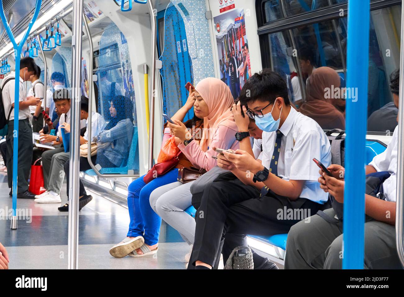 The interior of a modern subway car. New beautiful wagon. People in the ...