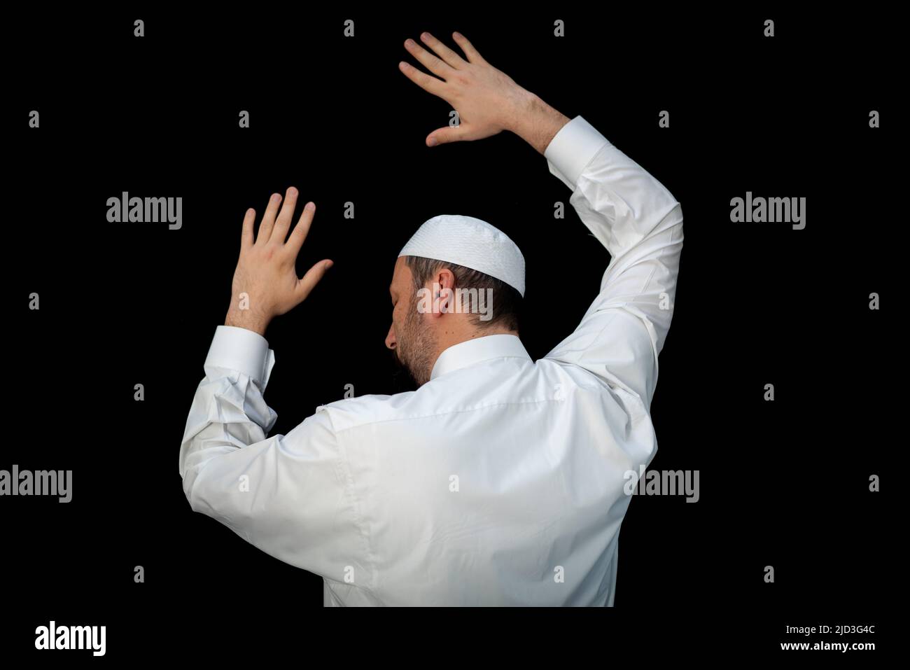 Muslim man standing and praying in the front of Kaaba in Mecca, KSA ...