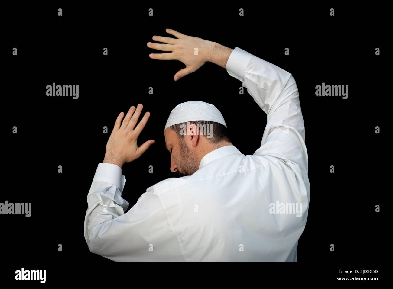 Muslim man standing and praying in the front of Kaaba in Mecca, KSA ...