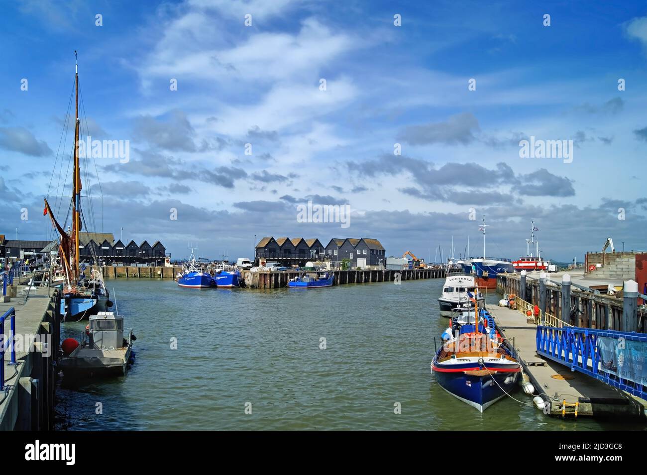 UK, Kent, Whitstable Harbour, Boats and Fishermans Huts Stock Photo - Alamy
