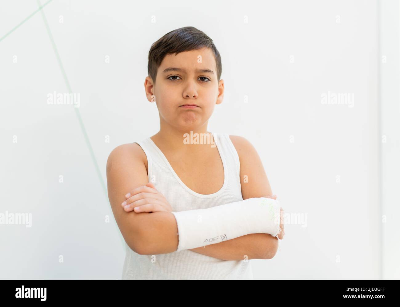 Boy keeps broken arm in gypsum, plaster arm, accident at home , injury ...