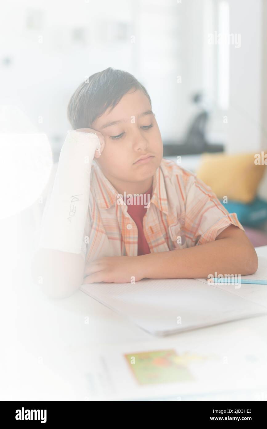Happy pre teen boy studying hi-res stock photography and images - Alamy